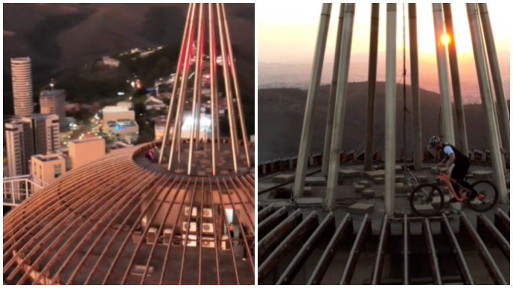 Ciclista pedala em cima do restaurante Topo do Mundo